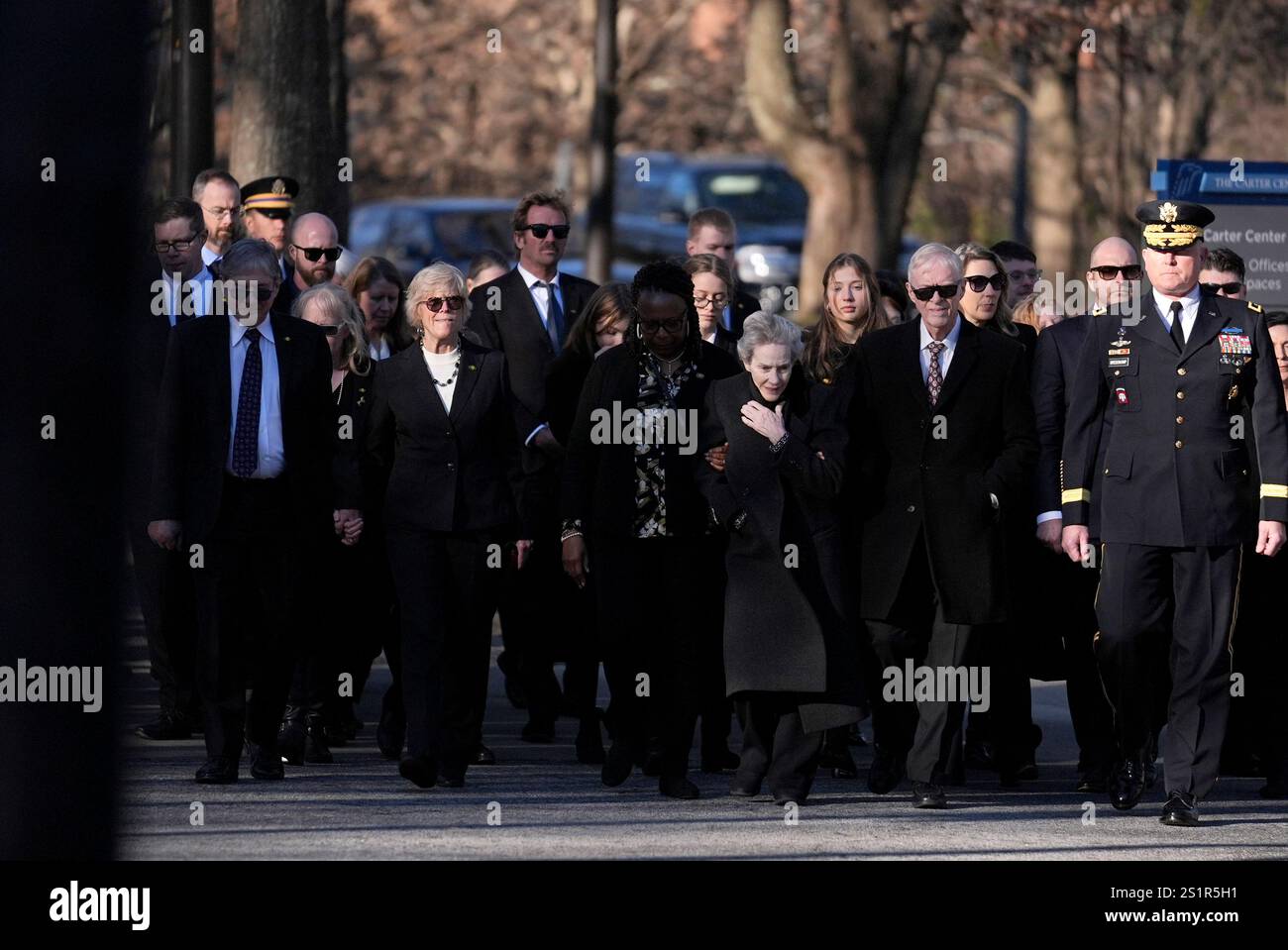 Jack Carter, second right, the son of former President Jimmy Carter ...