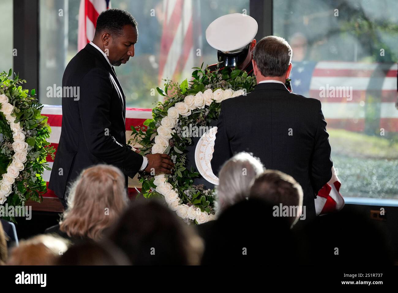 Atlanta Mayor Andre Dickens and Georgia Gov. Brian Kemp lay a wreath ...