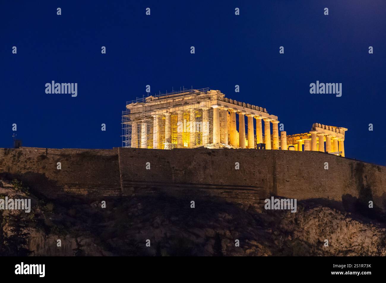 Illuminated Acropolis of Athens at Night Against Deep Blue Sky Stock ...