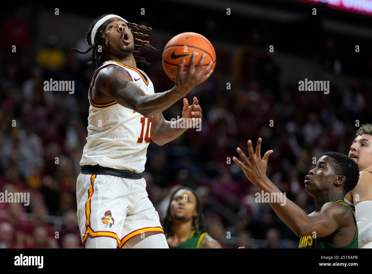 Iowa State guard Keshon Gilbert (10) drives to the basket over Baylor ...