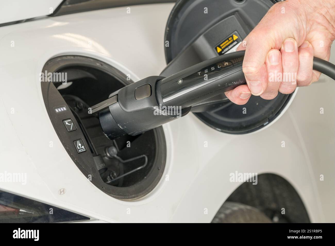 Georgetown, TX - 4 January 2025: Level 2 charging with J1772 adaptor on ...