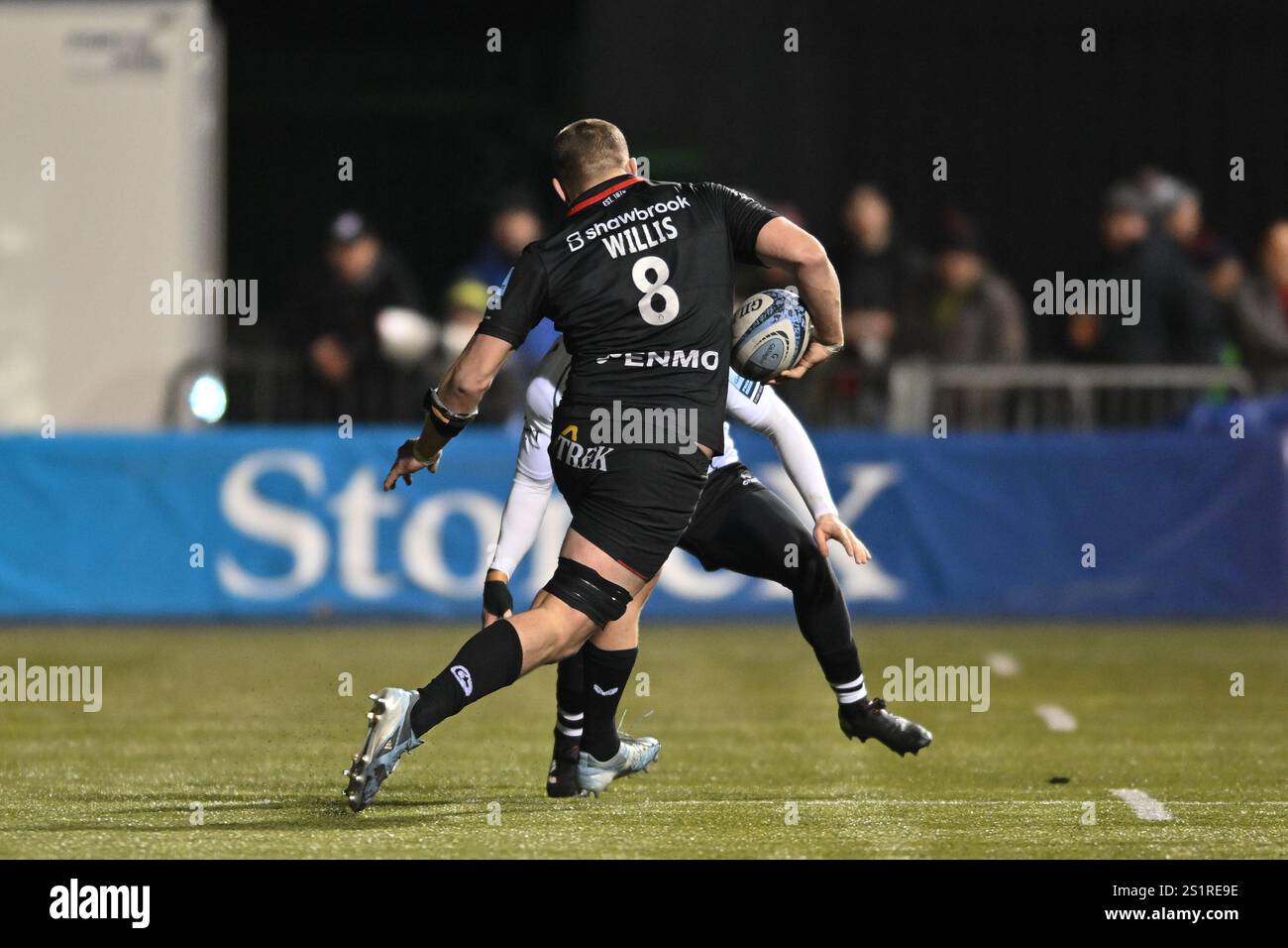 Tom Willis of Saracens side steps the Bristol Bears tackle by Noah ...