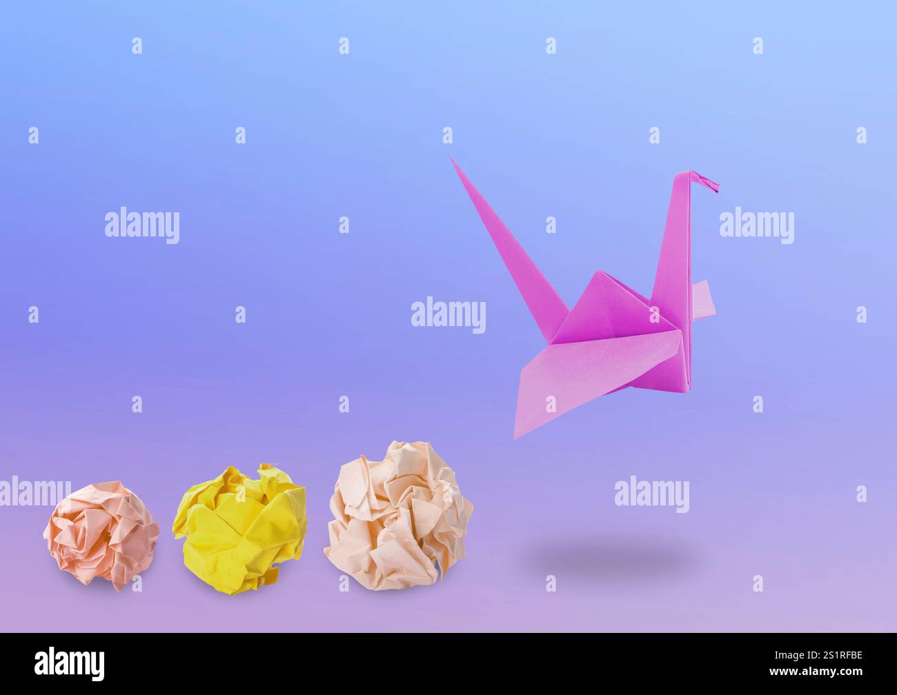 Pink origami crane and crumpled paper balls on violet gradient ...