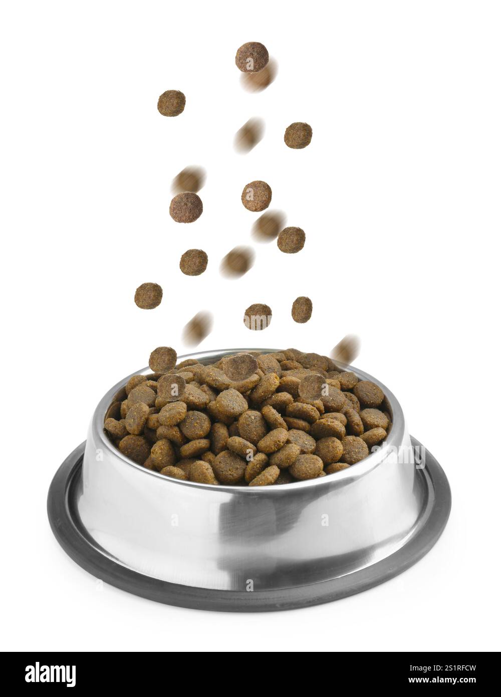 Dry pet food falling into bowl on white background Stock Photo - Alamy