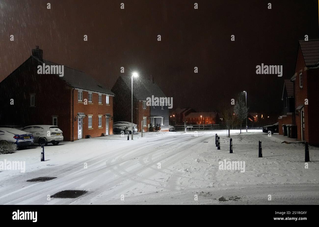 Snow falling in Basingstoke, Hampshire. Large parts of the country will ...