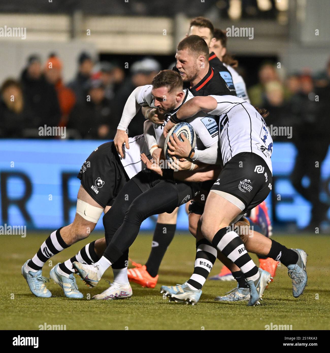Tom Willis of Saracens tackles and drives Rich Lane of Bristol Bears ...
