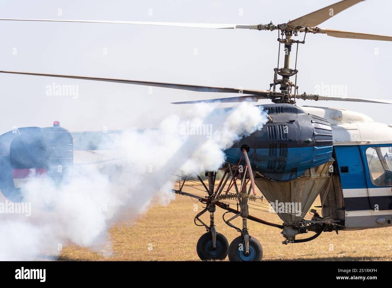 The engine of an old Soviet Kamov Ka-26 agricultural helicopter starts ...