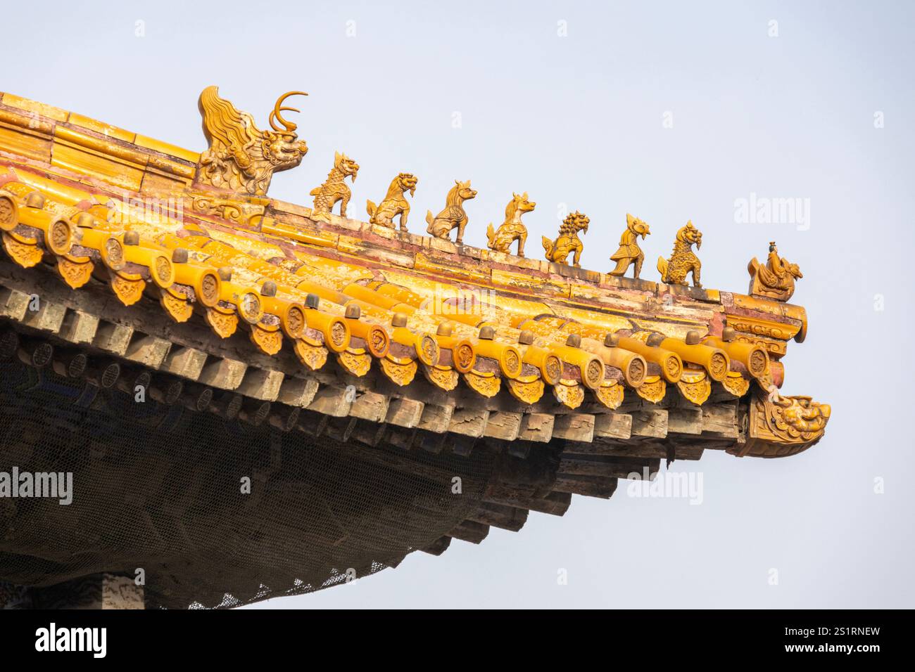 Close-up shot of imperial roof decoration in Forbidden City. Old ...