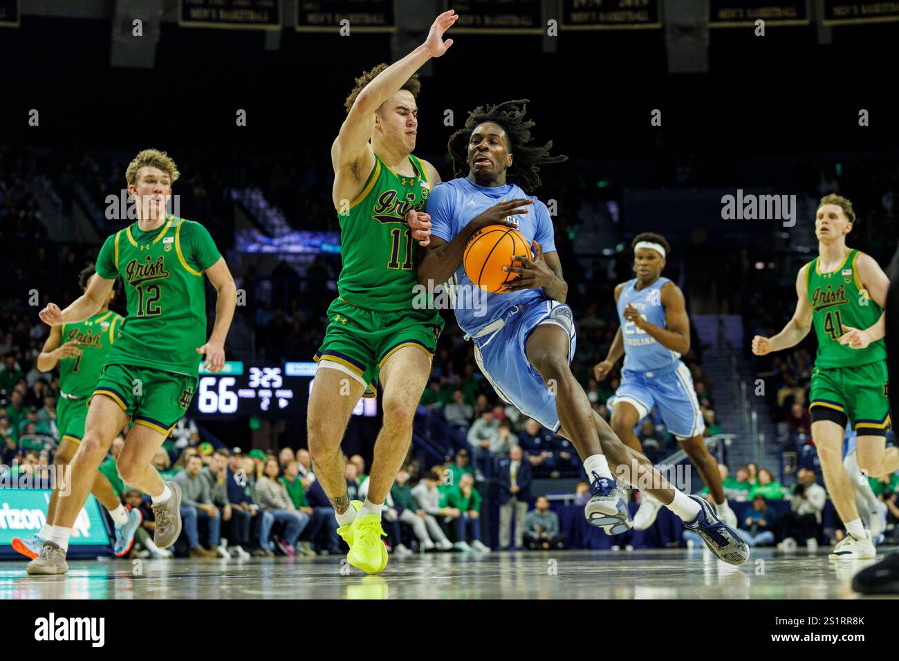 January 04, 2025: North Carolina guard Ian Jackson (11) drives to the ...