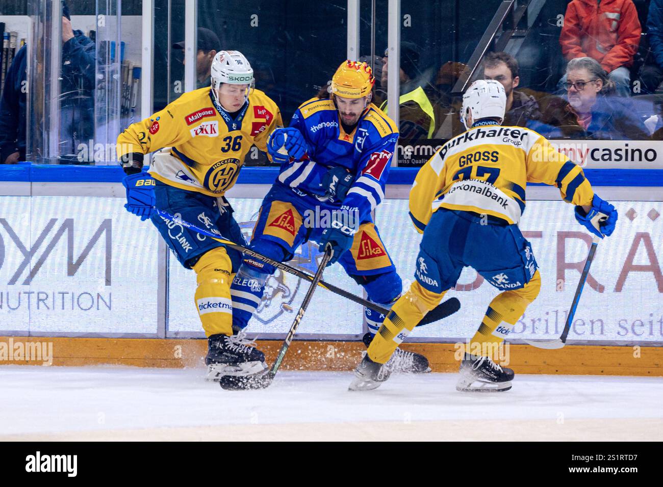 Simon Knak #36 (HC Davos) and Nico Gross #77 (HC Davos) edit top scorer ...