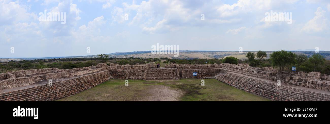 Ancient Stone Ruins Surrounded by Rolling Hills Under a Clear Sky ...