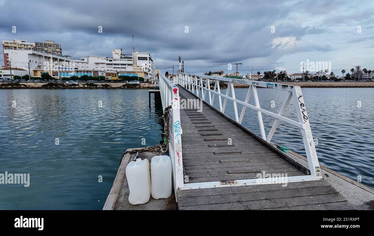 the portable ramp or bridge at pier de faro in faro, portugal, used to ...
