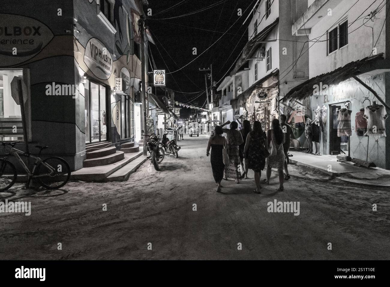 Evening Walk Along a Busy Urban Street with Shops and Lights, Isla ...