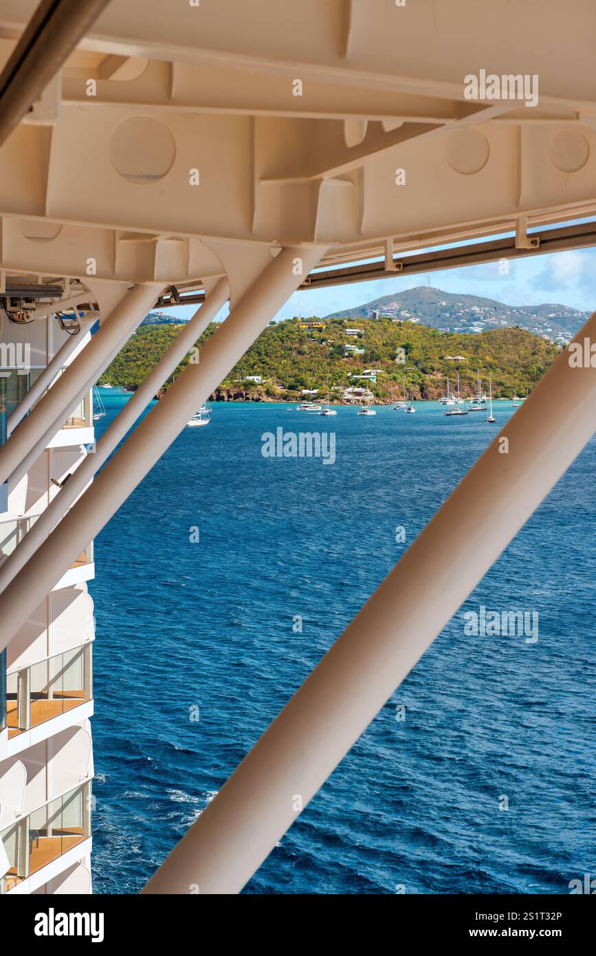 A unique perspective from a cruise ship frames the serene blue waters ...