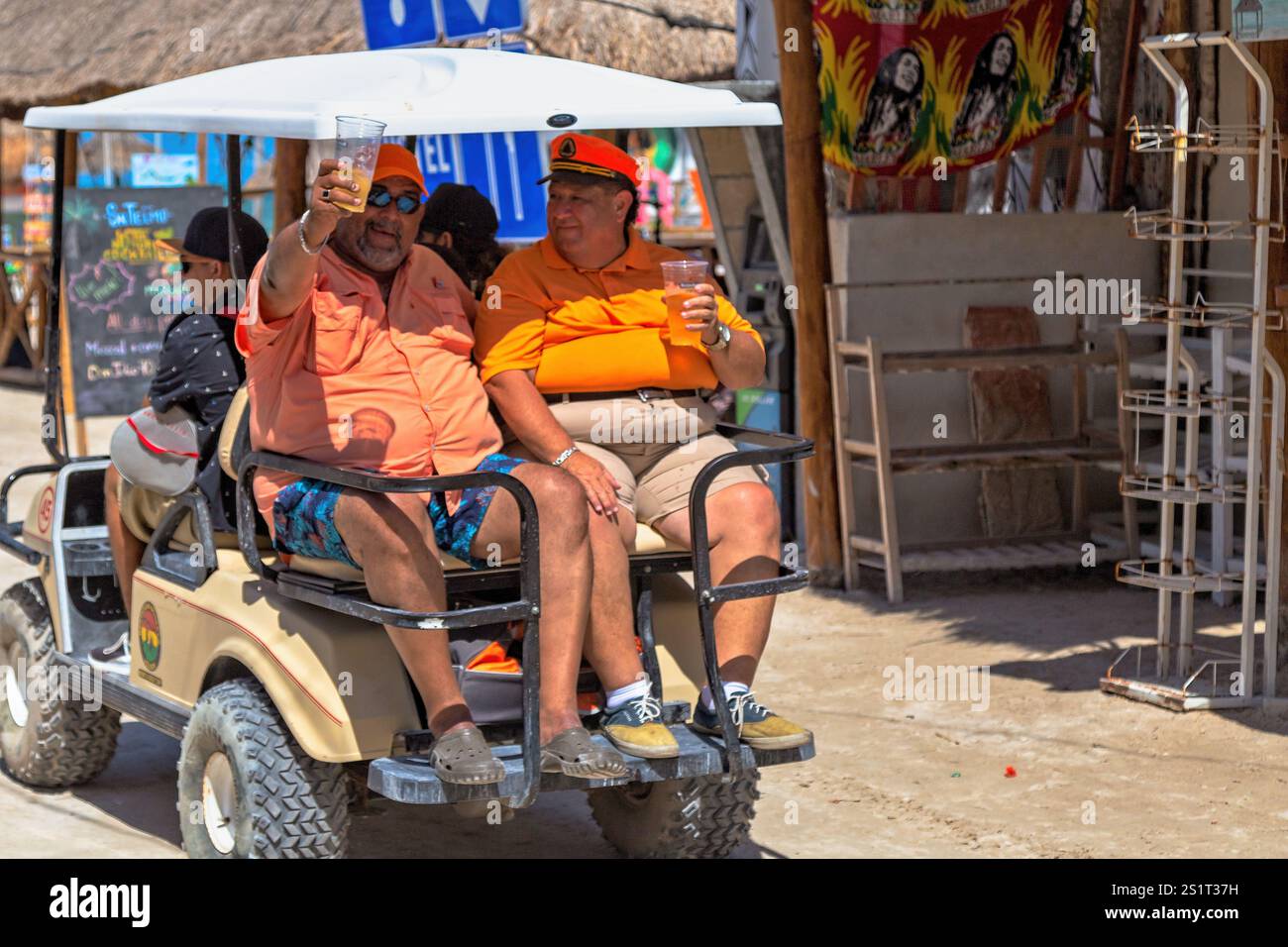 Group of People Enjoying Leisure Time on a Golf Cart Ride, Isla Holbox ...