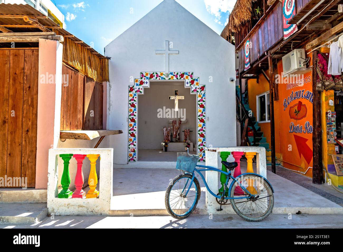Colorful Church Exterior with Bicycle in a Vibrant Mexican Street Scene ...