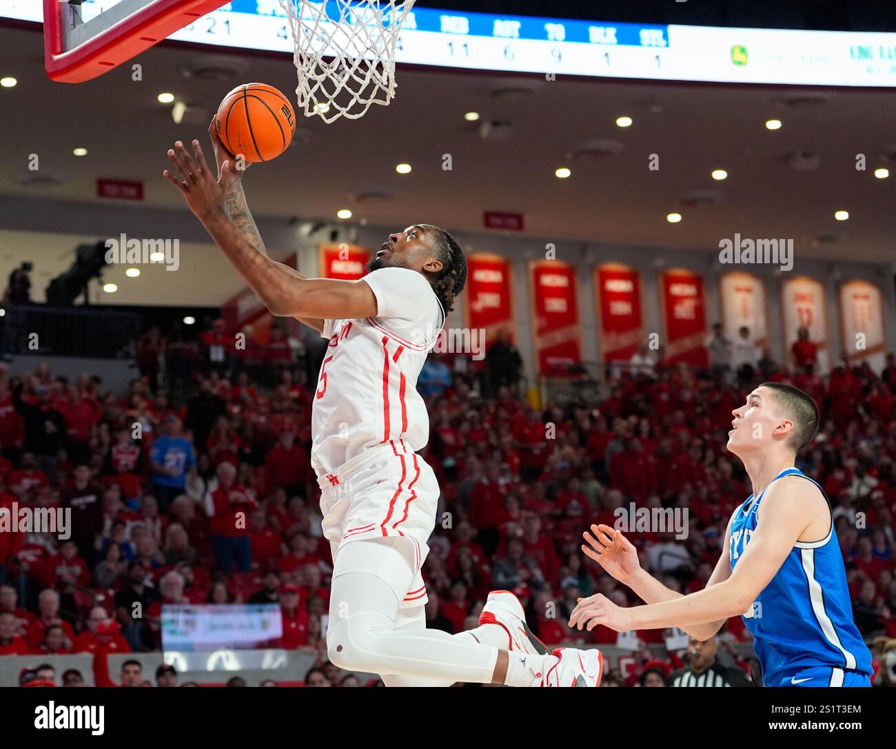 Houston, Texas, USA. 4th Jan, 2025. Houston forward JA'VIER FRANCIS (5) goes to the basket ...