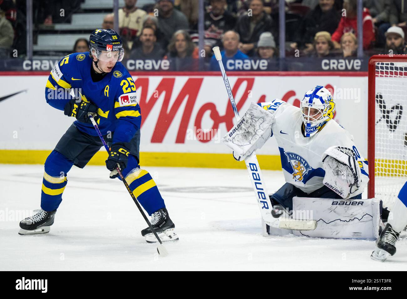 Otto Stenberg of, Sweden. , . and goaltender Petteri Rimpinen of ...