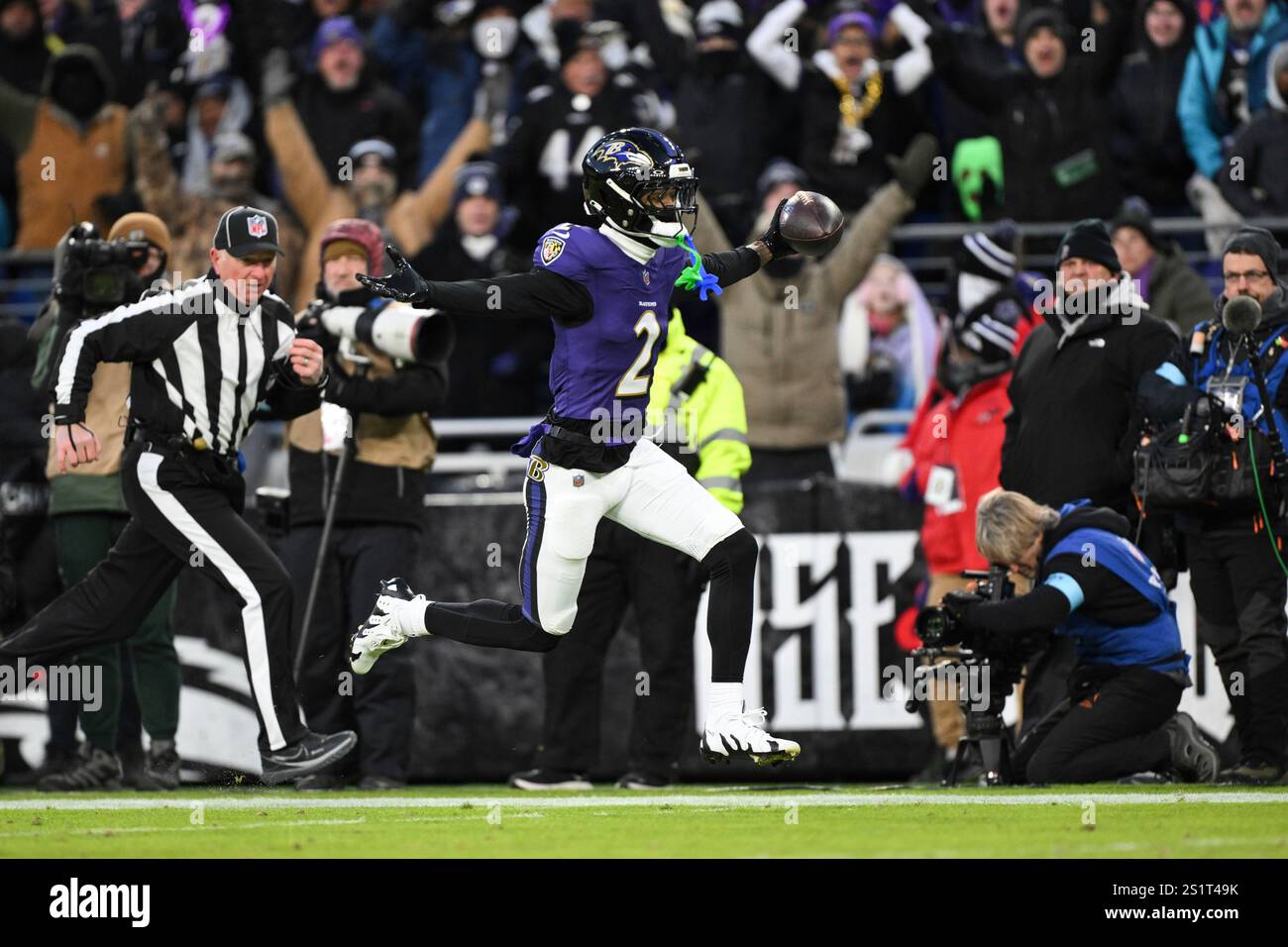 Baltimore Ravens cornerback Nate Wiggins (2) celebrates as he returns ...