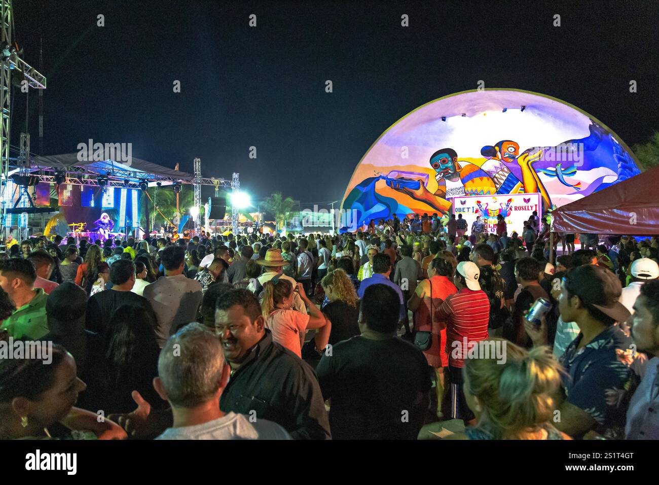 Lively Carnival Outdoor Night Festival with Crowd and Creative Mural in ...