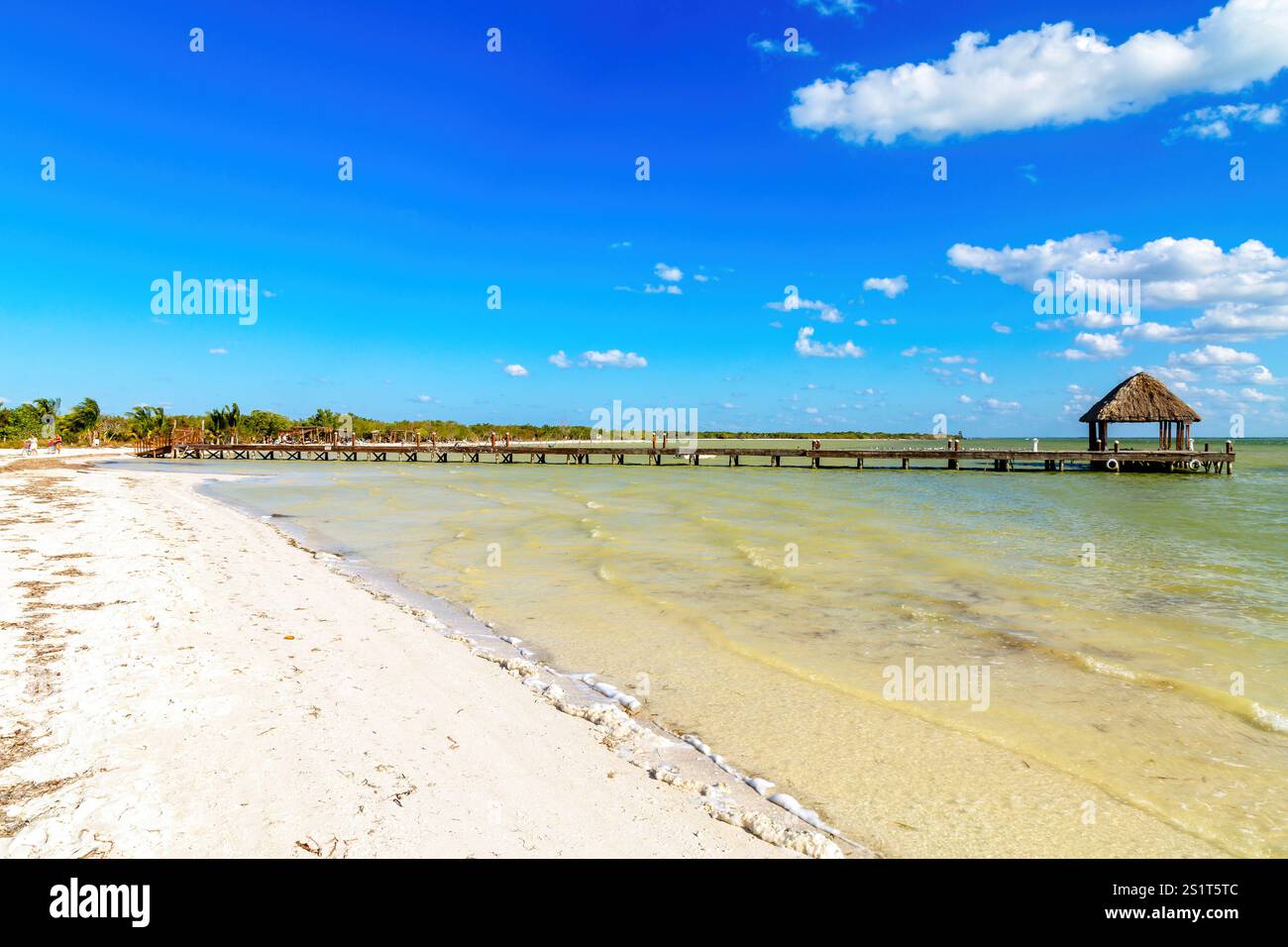 Serene Tropical Beach With Dock And Hut Under Clear Blue Sky, Isla ...