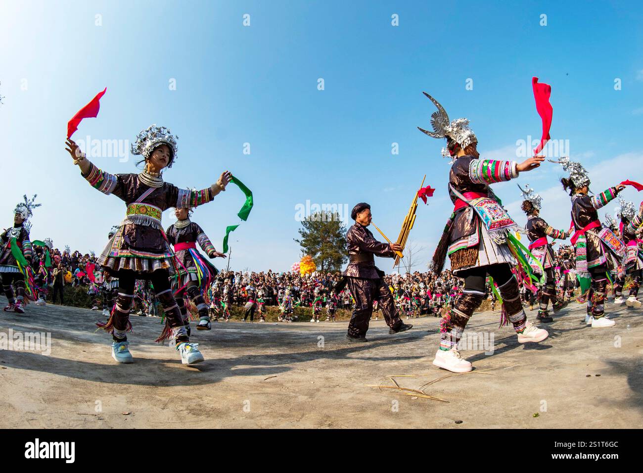 Photo taken on Jan 4, 2025 shows the Lusheng dance of the Miao ethnic ...