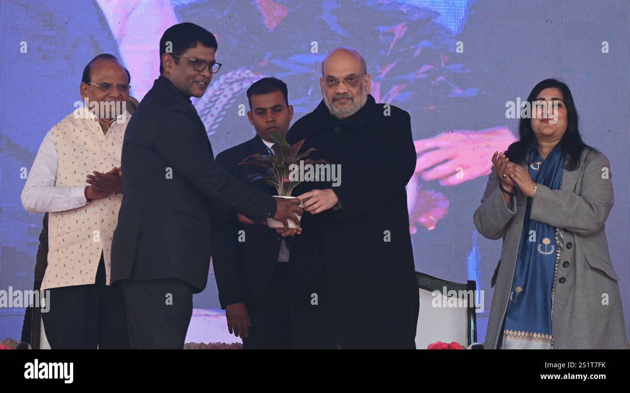 NEW DELHI, INDIA - JANUARY 4: NDMC Chairperson Keshav Chandra present a plant to Union Home ...