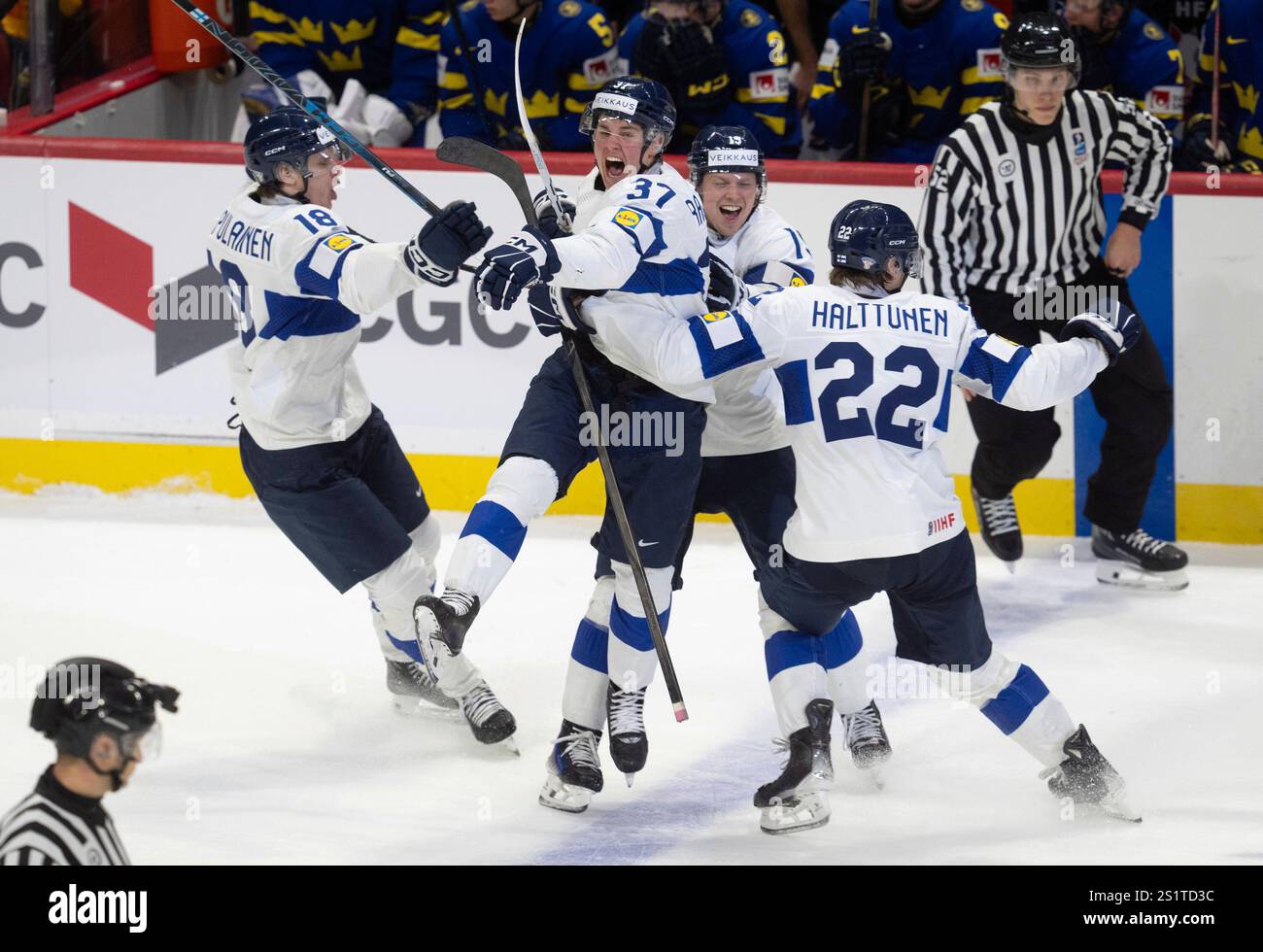 Finland's Benjamin Rautiainen (37) celebrates with teammates Rasmus ...