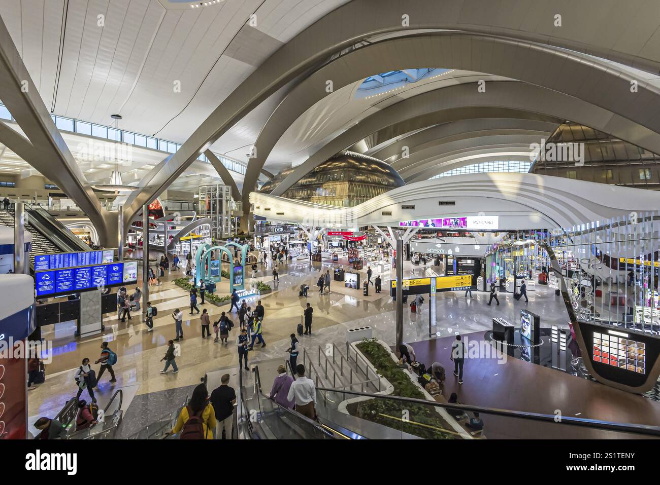 Abu Dhabi Airport, Zayed International Airport with passengers. The new Terminal A has a ...