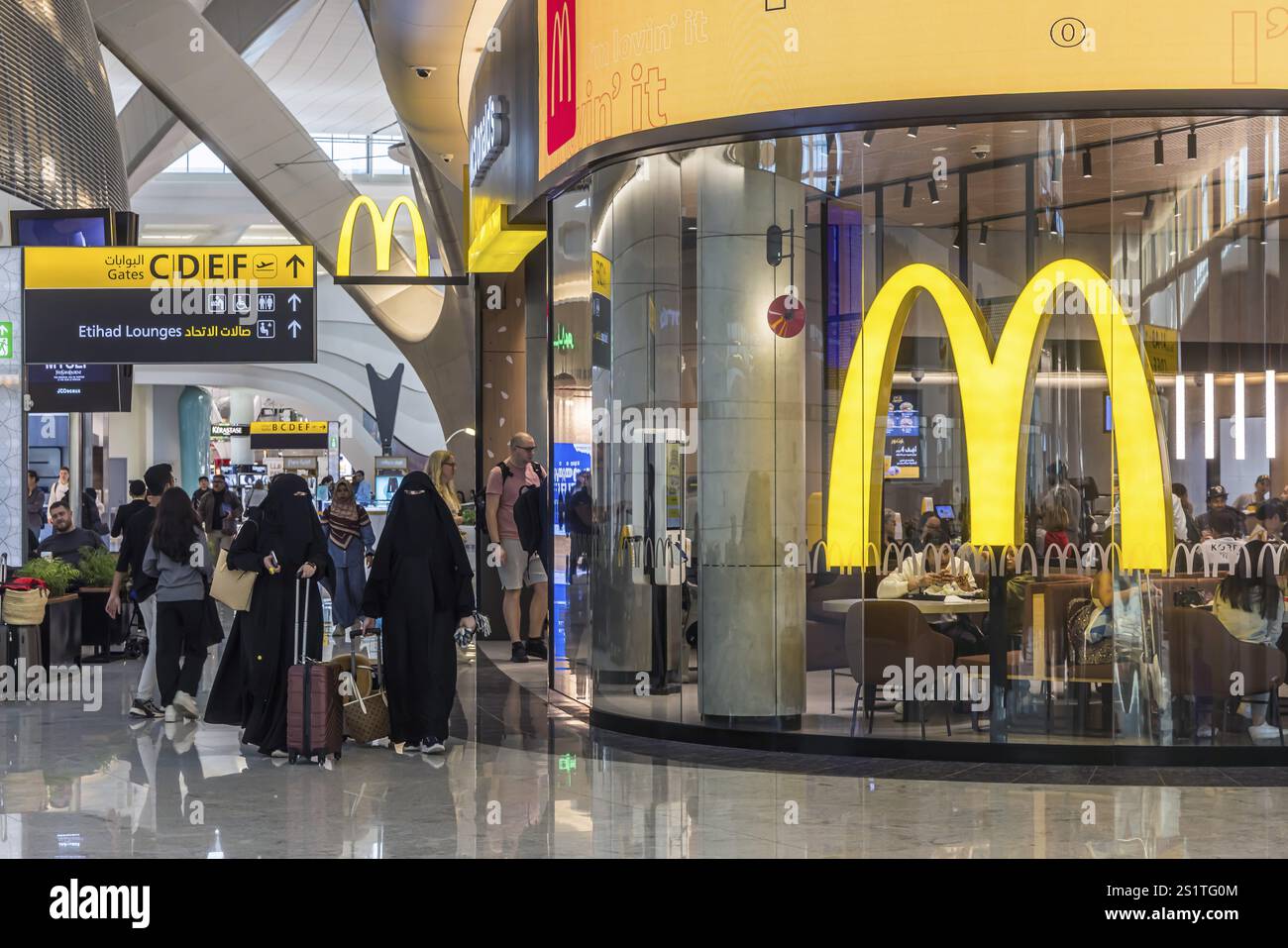 Abu Dhabi Airport, Zayed International Airport with passengers ...