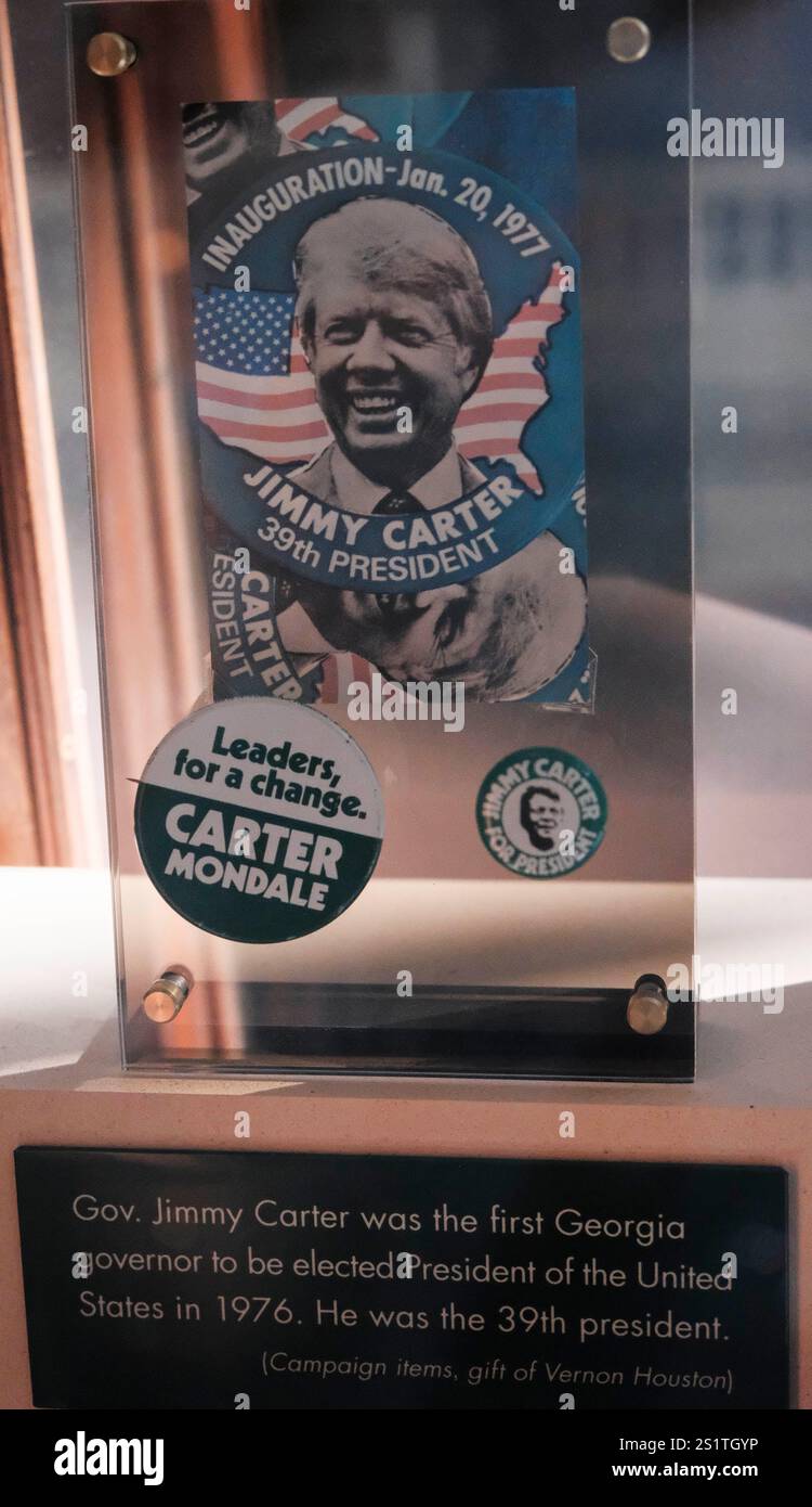 Atlanta, Georgia, USA. 4th Jan, 2025. A placard with a photo of former ...