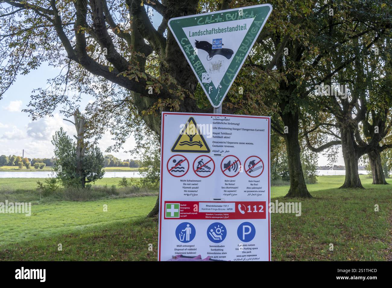 Information and warning sign at the Rheinpark Neuss on Rheinallee ...