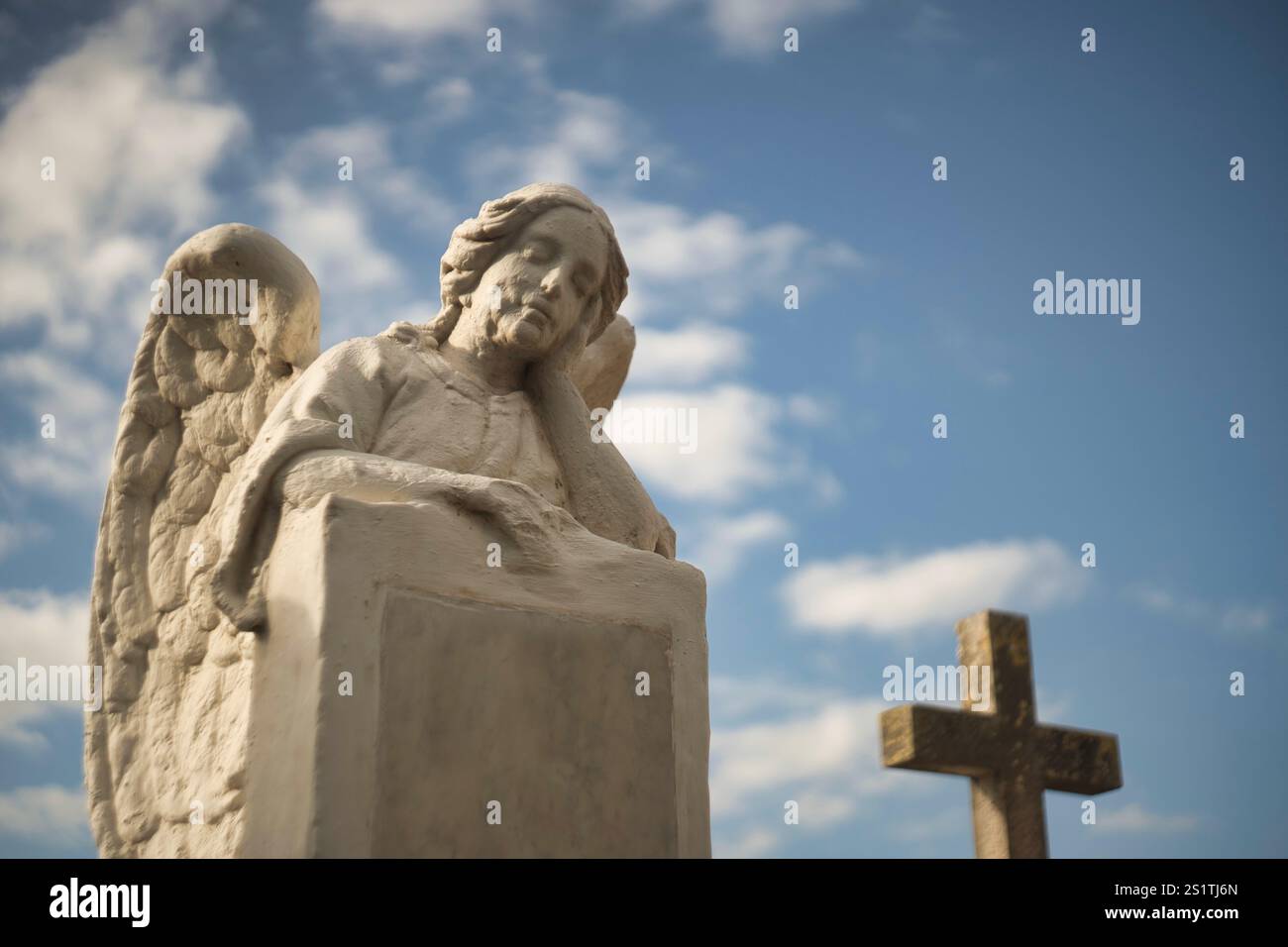 Female angel on the headstone of a grave in a cemetery near Valetta ...