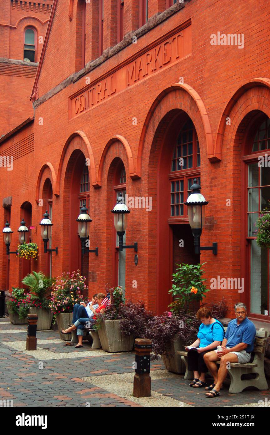 People stand outside the historic Central Market, a farmers and ...