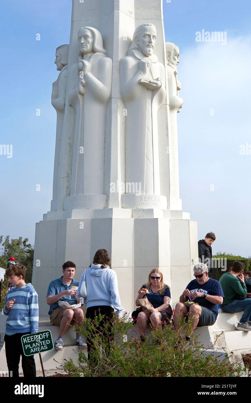 Visitors picnicking beneath the Astronomers Monument statue outside the ...