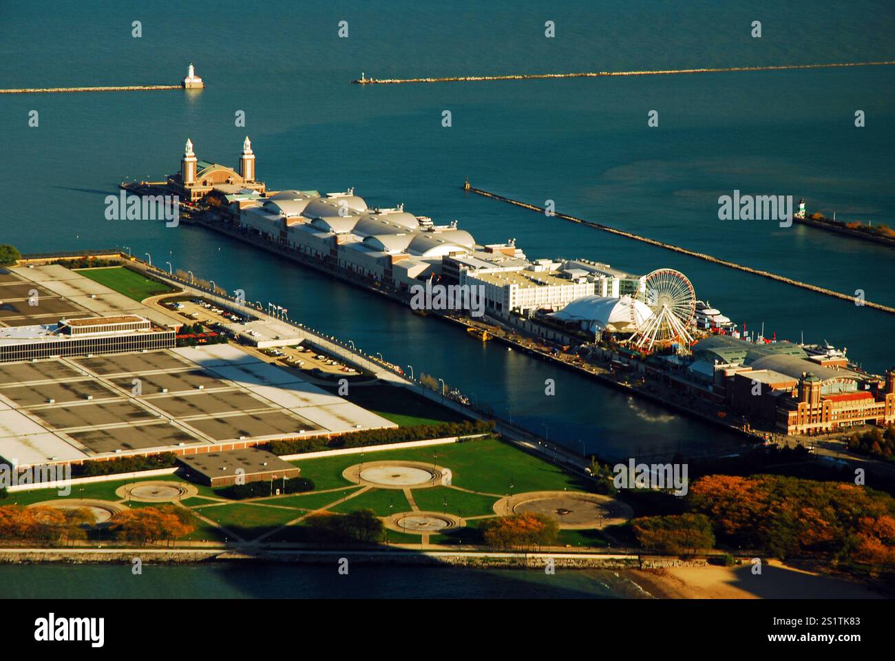 The rides and attractions of Navy Pier in Chicago is seen jutting into ...