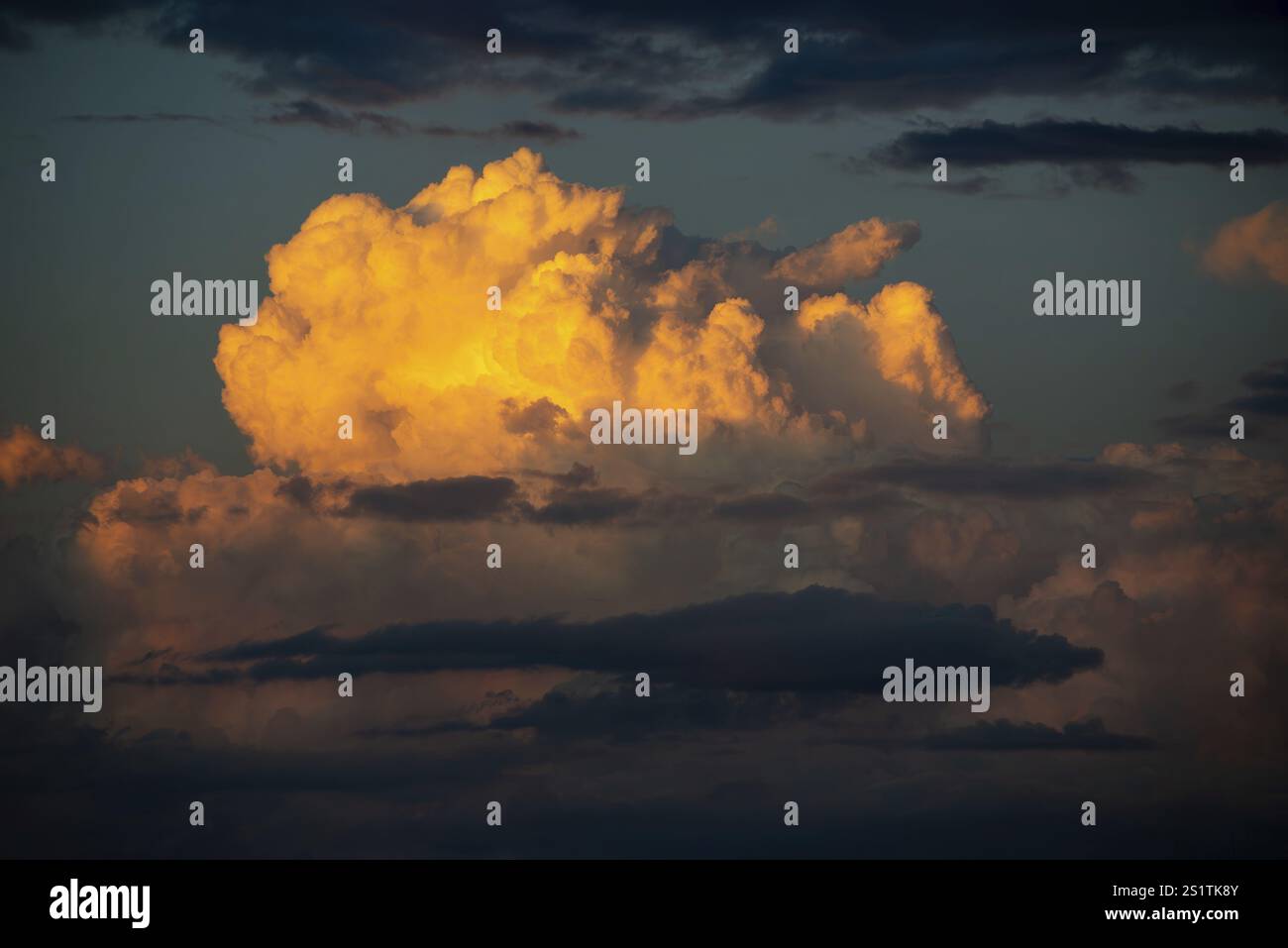 Cumulonimbus thundercloud at sunset with dramatic sky in front of a ...