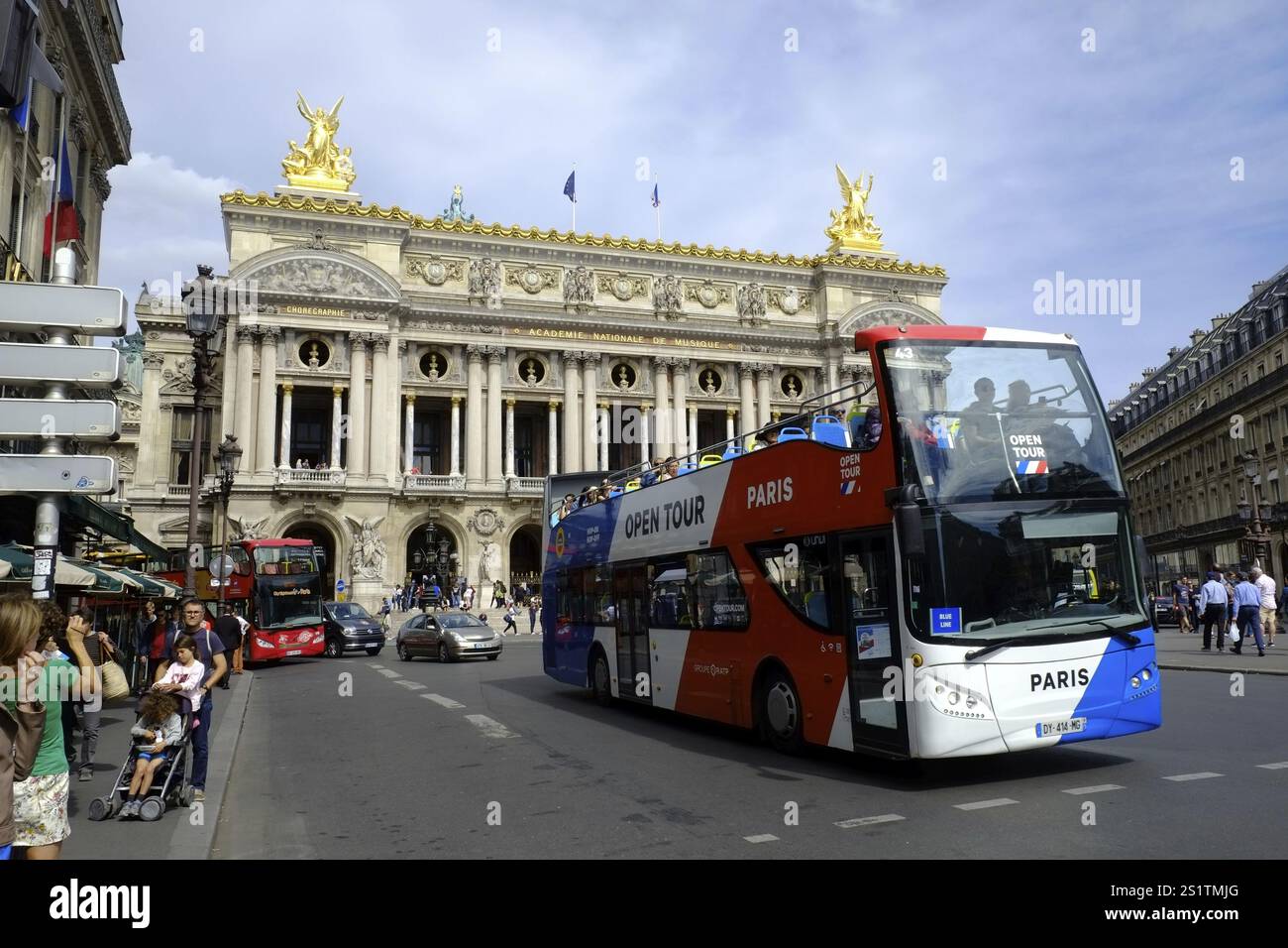 Sightseeing bus in front of the Opera Garnier at the Place de l?opera ...
