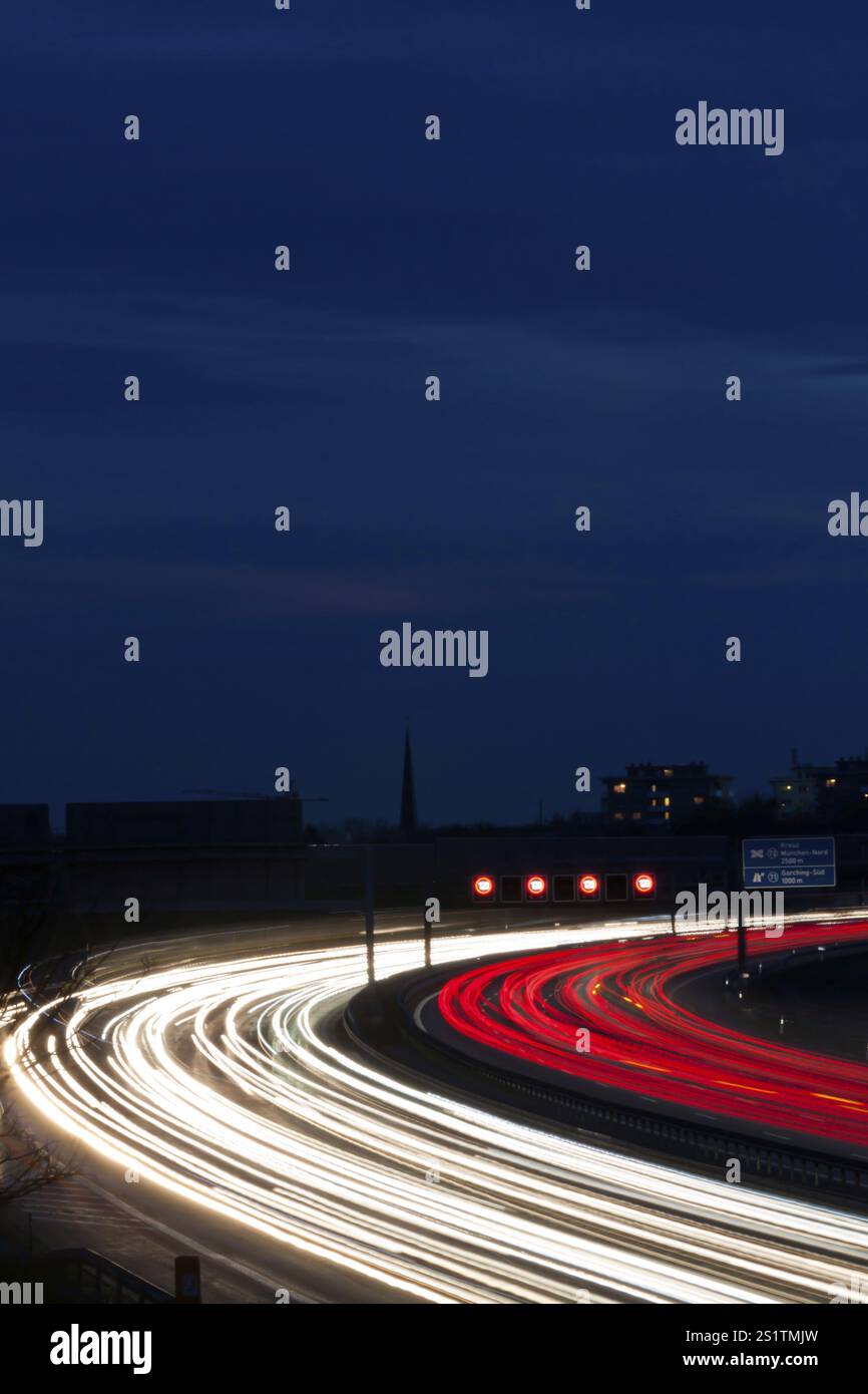 Cars on a motorway at night. Snakes of light and tracers Austria Stock ...