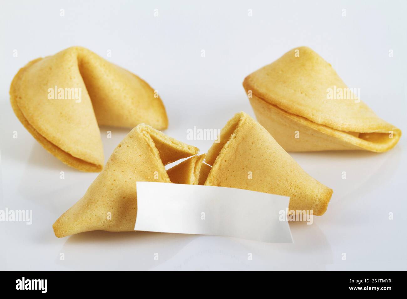 Fortune biscuits on a light background Stock Photo - Alamy