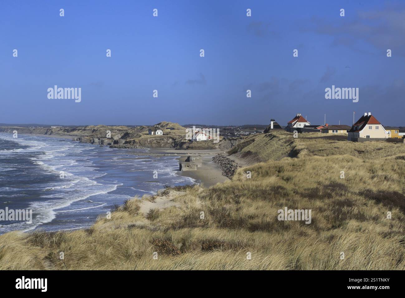 View from the dunes to the beach with fallen bunkers of the German ...