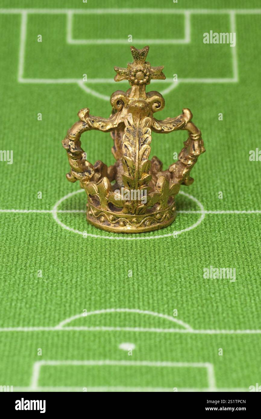 Symbol photo - Crown on football pitch Stock Photo - Alamy