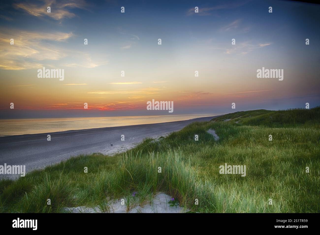 Beautiful sunset at the north sea coast of Denmark in summertime Stock ...