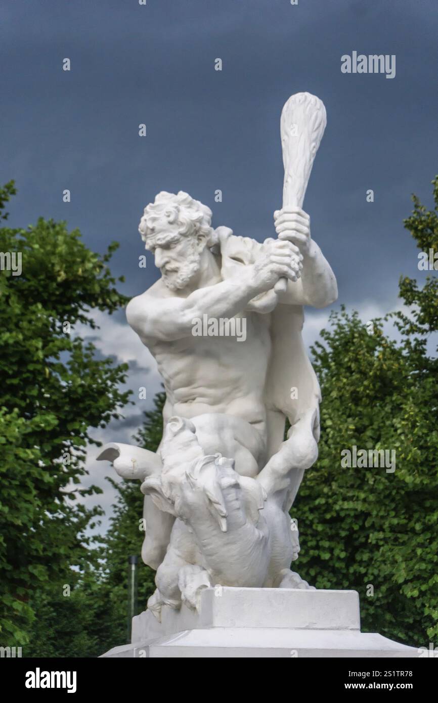 Statue of a strong man in front of the castle in Karlsruhe made of ...