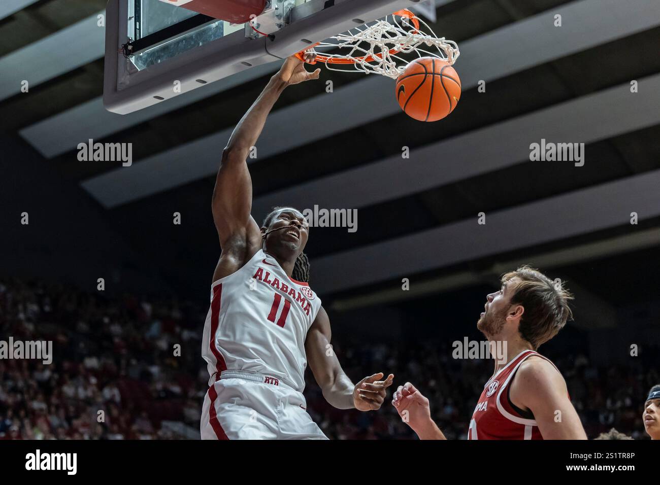 Alabama center Clifford Omoruyi (11) dunks the ball during the first ...