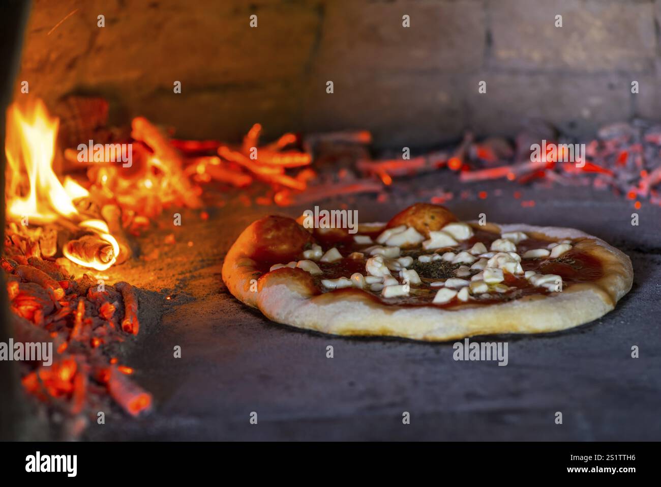 Original Italian pizza from the wood fire oven Stock Photo - Alamy
