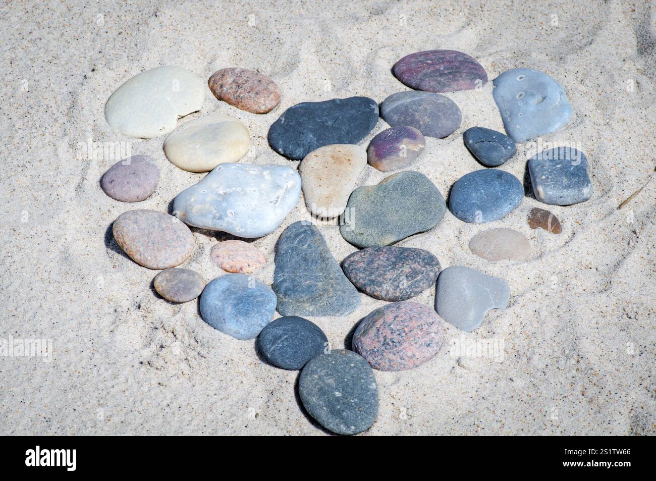 Round pebbles on the beach in Denmark is a symbol for balance. Stones ...