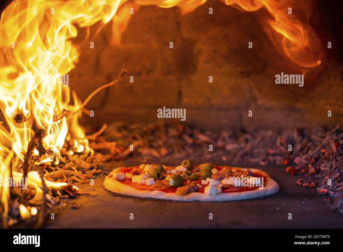 Original Italian pizza from the wood fire oven Stock Photo - Alamy