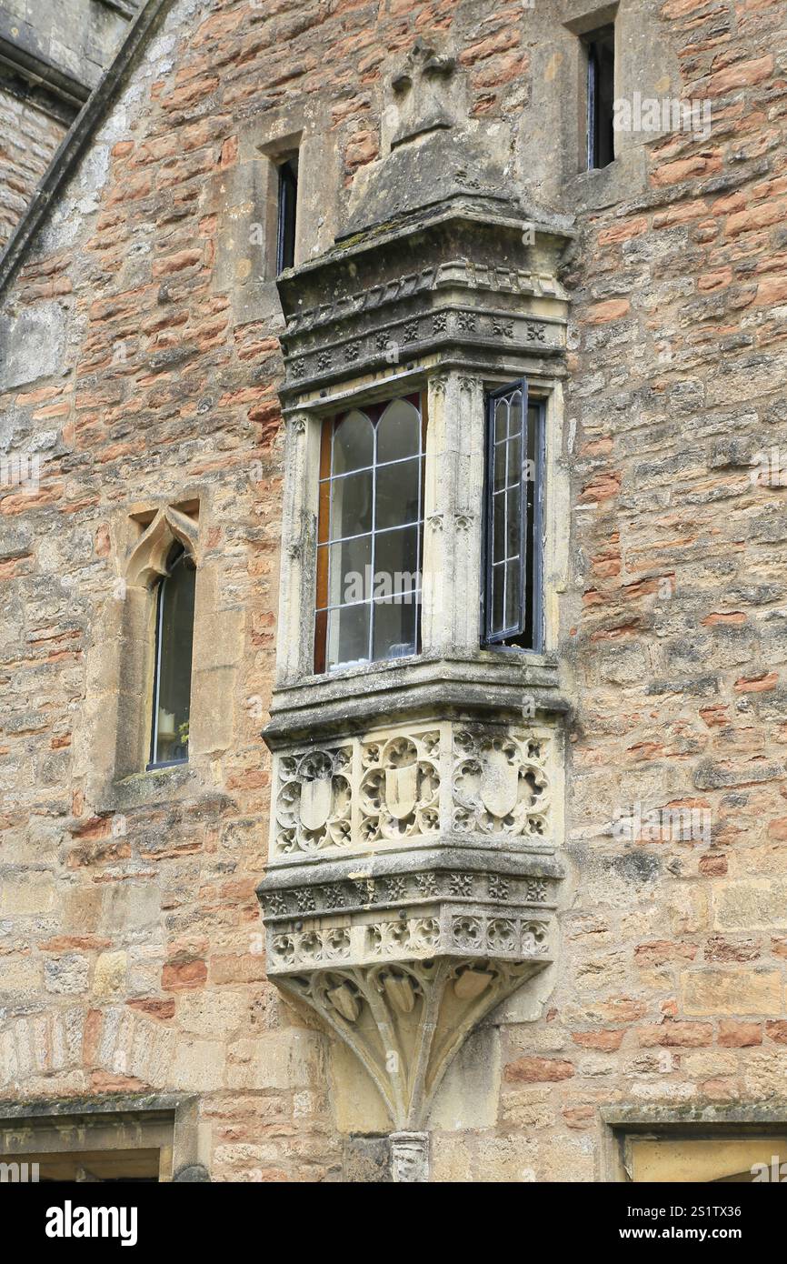 Bay window on Gothic house next to Wells Cathedral, Somerset, England ...