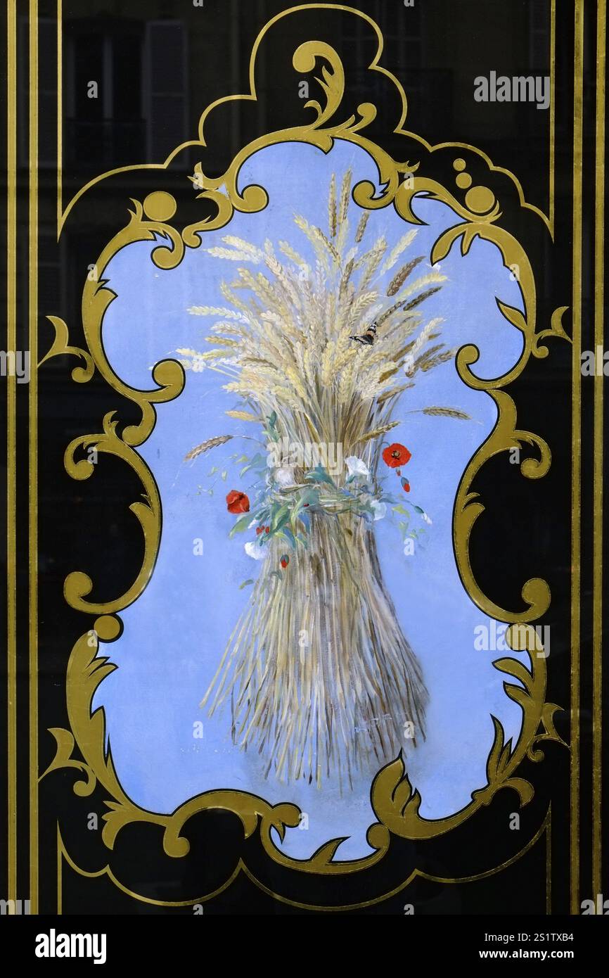 Artistically designed glass shop sign depicting a sheaf of grain on a ...
